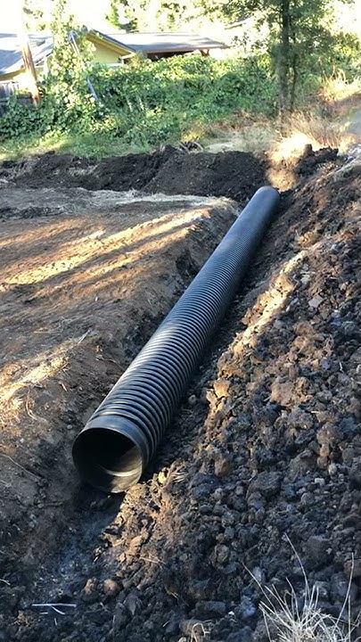 Installing culvert 12” water pipe for my driveway with my John Deere ...