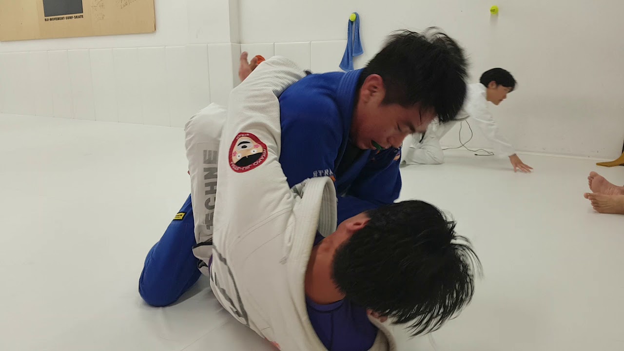 2 on 1 flip sweep from closed guard - YouTube