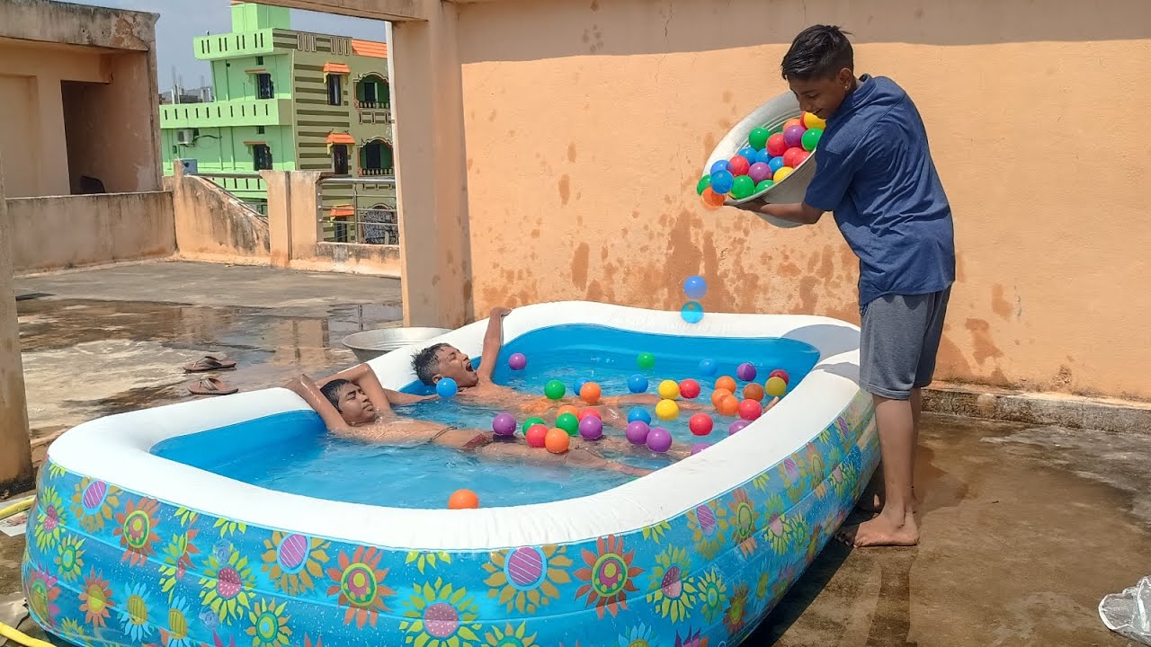Challenge of throwing a ball in a small swimming pool / చిన్న ...