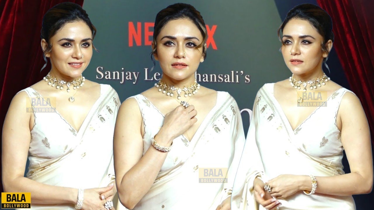 Amruta Khanvilkar DAZZLED In Shiny White Saree Blouse at Netflix ...