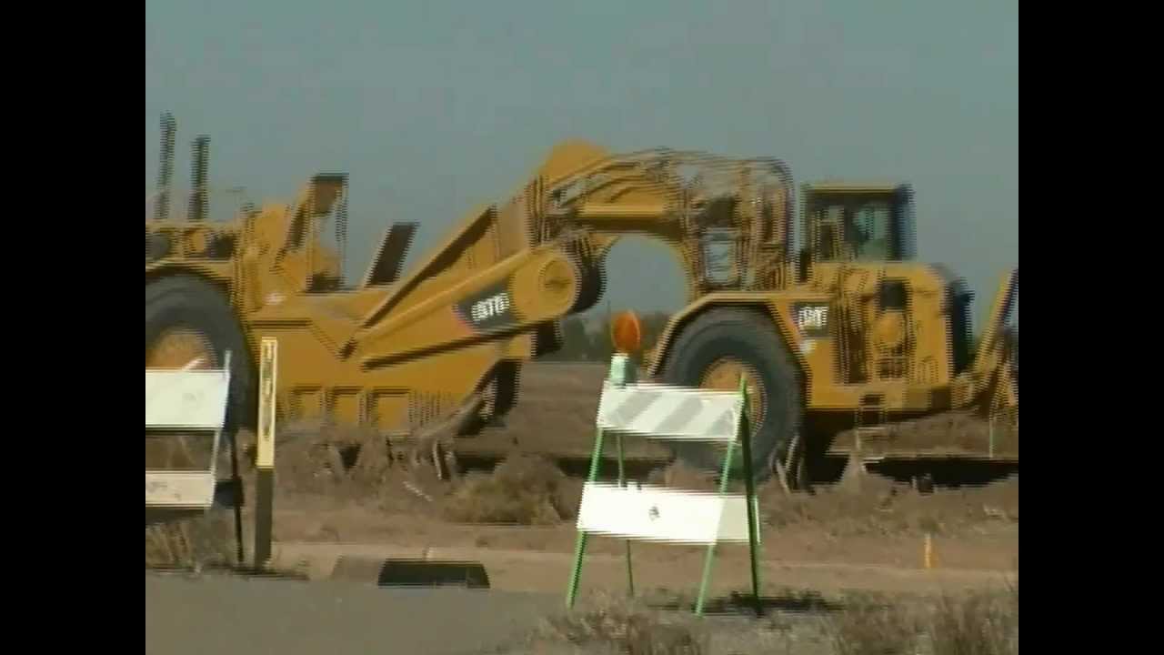 CAT 637G Scraper Drive By - YouTube