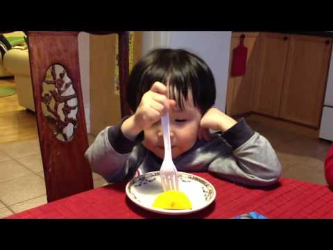 Pascal eating mangoes