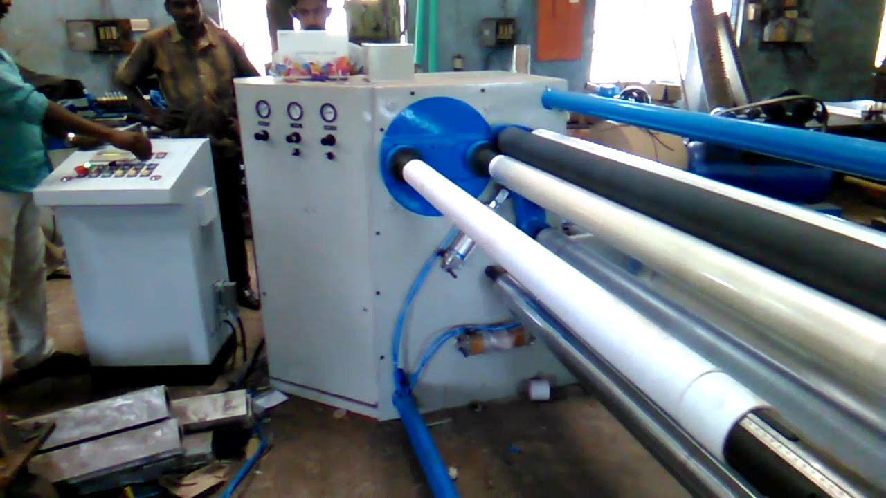 Log roll rewinding machine - YouTube