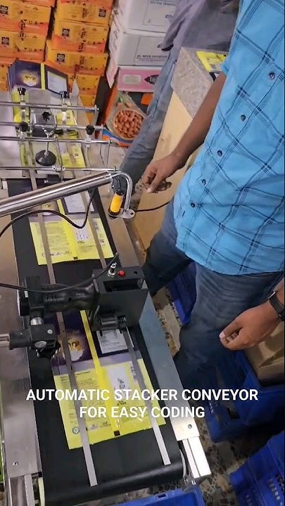 Fully automatic MRP Batch coding machine with stacker conveyor - YouTube