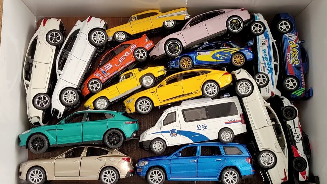 Box full off model cars,toyota Corolla,Porsche Cayenne,Ambulance ...