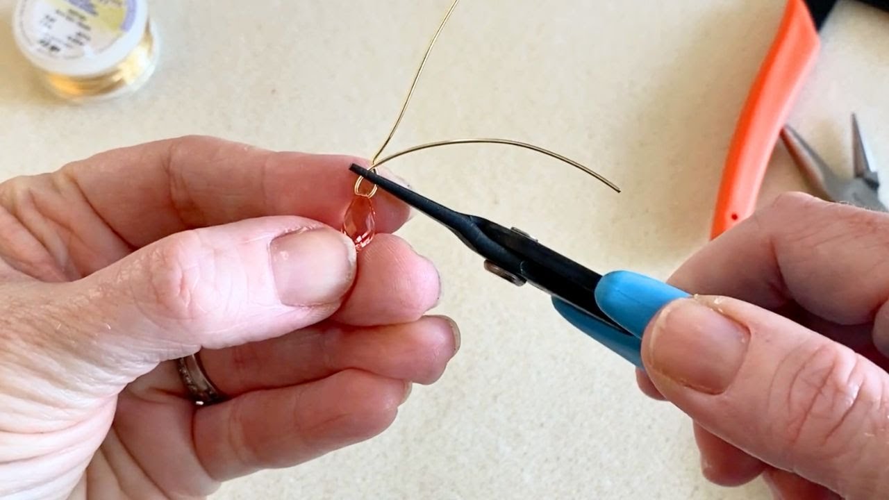 How to Make a Loop on Top of a Side Drilled Bead - YouTube