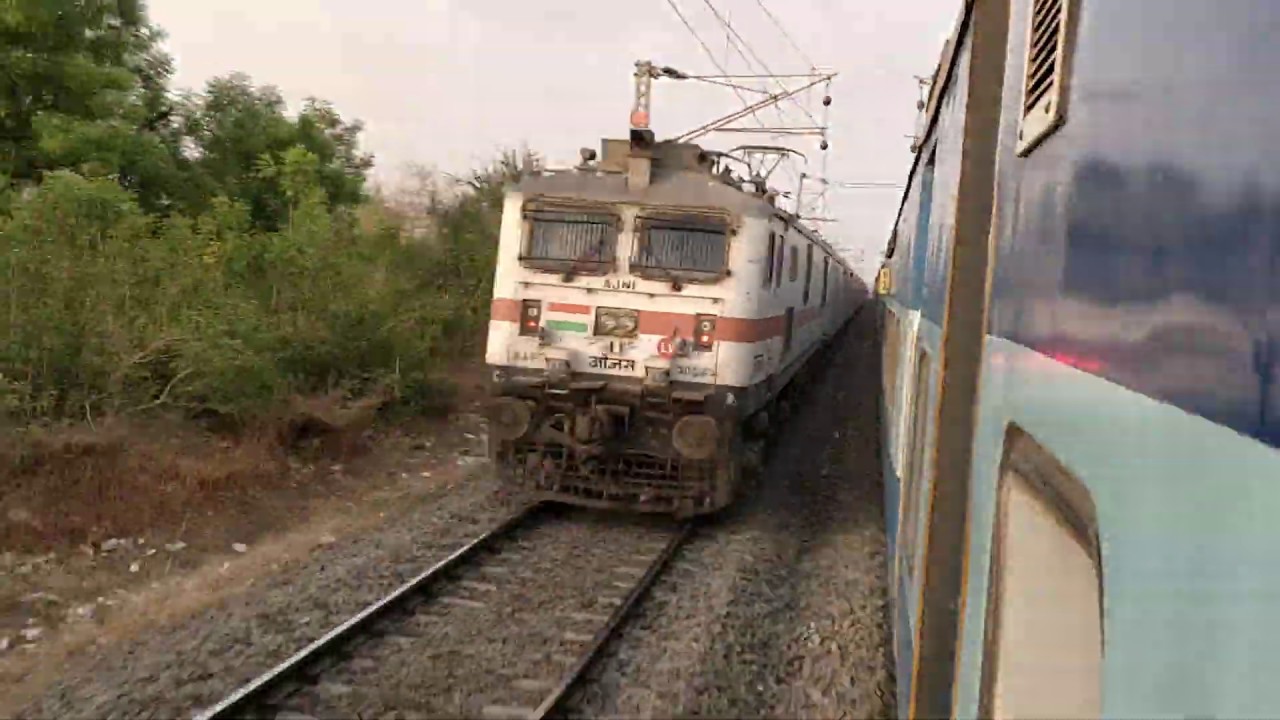 NZM Mumbai CSMT Rajdhani Express meets Mahanagari Express near Pachora ...