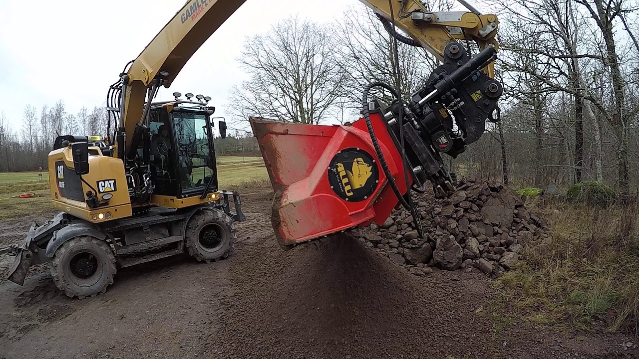 CAT M315F - separates gravel and stone ALLU & Rototilt | Part 8 - YouTube