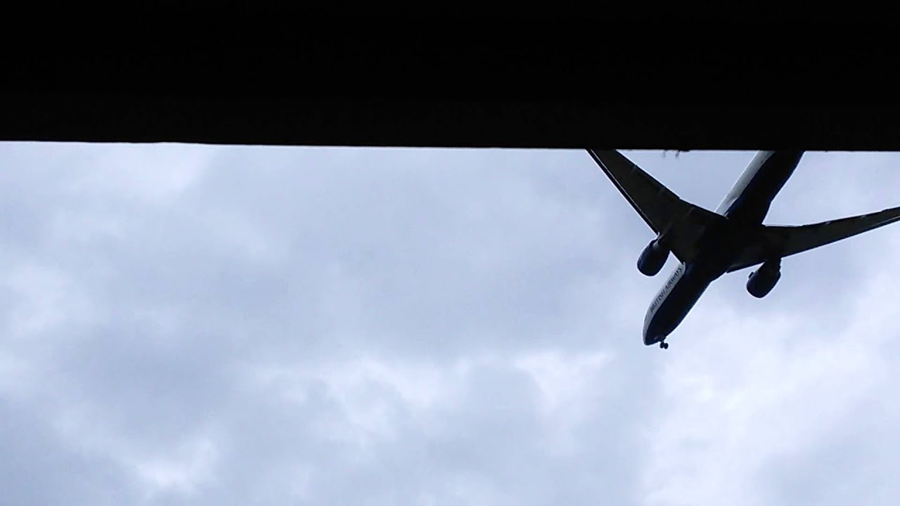 Plane flying over very low 2 - Heathrow London. - YouTube
