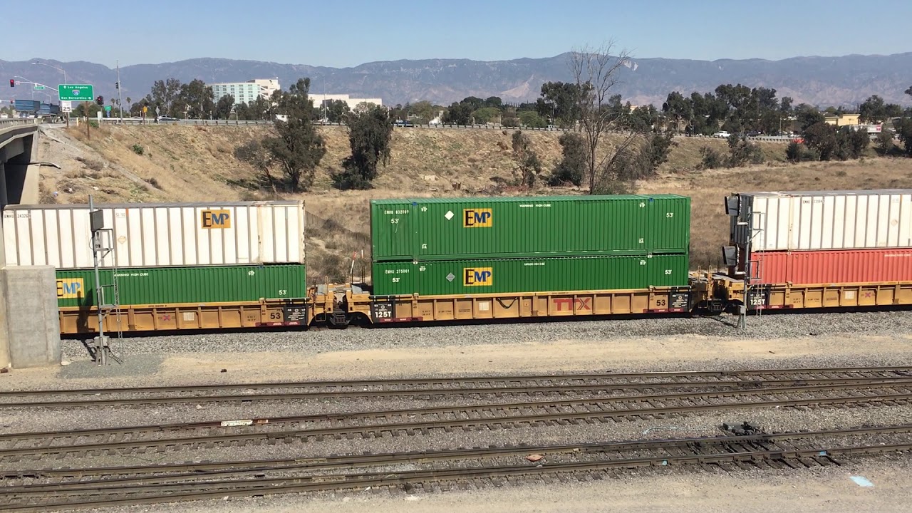 UP 8786 Eastbound Stack meets UP 8031 Westbound Stack at West Colton Yard - YouTube