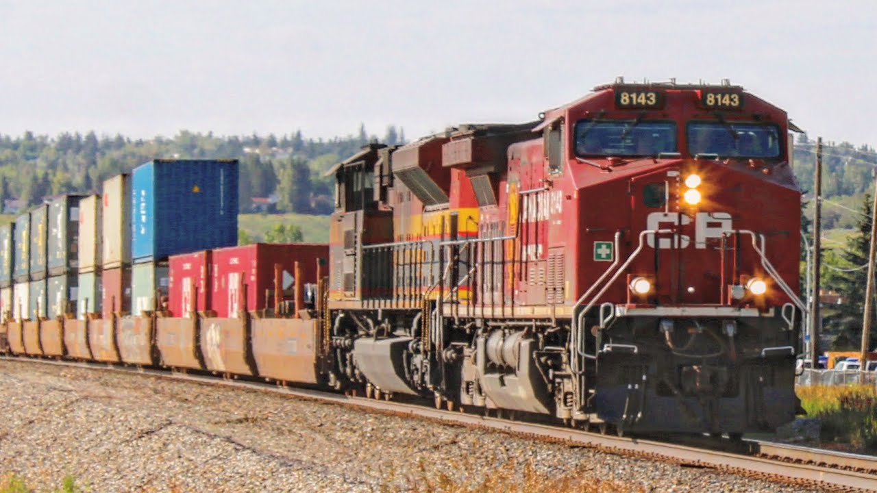 RARE! CP stack train with double KCS units and UP SD70ACE-T4 in middle ...