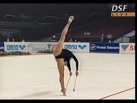 Beautiful flexible girl gymnast in leotard stretch her contortion limber body