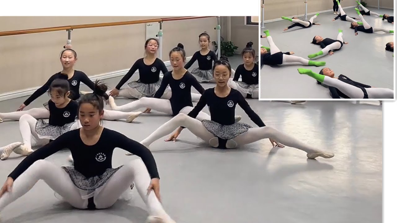 The girls in the dance training class make difficult moves very neatly ...