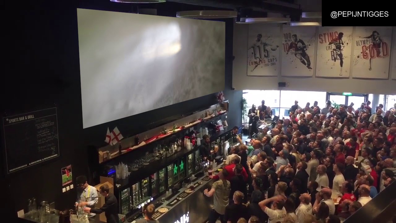 Crowd going wild in English pub over a sick barrel - YouTube