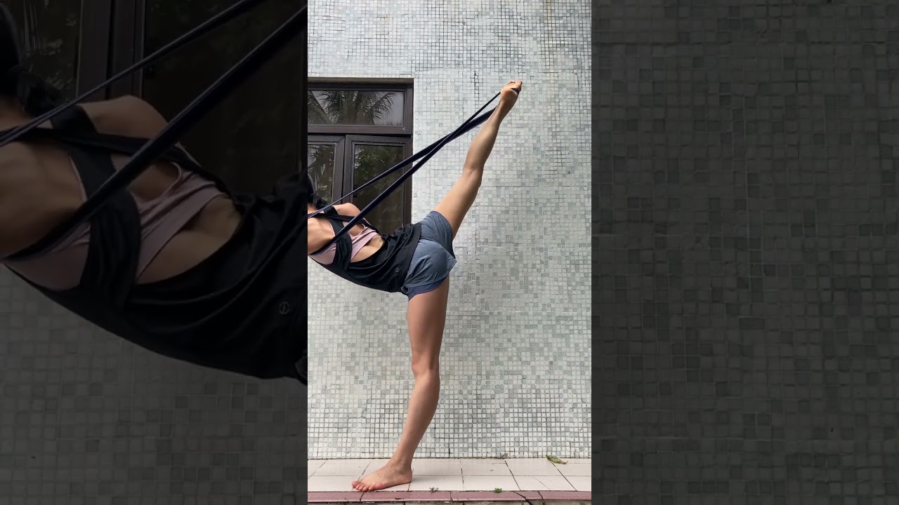 Use resistance band to stretch back leg for ballet Penché - YouTube