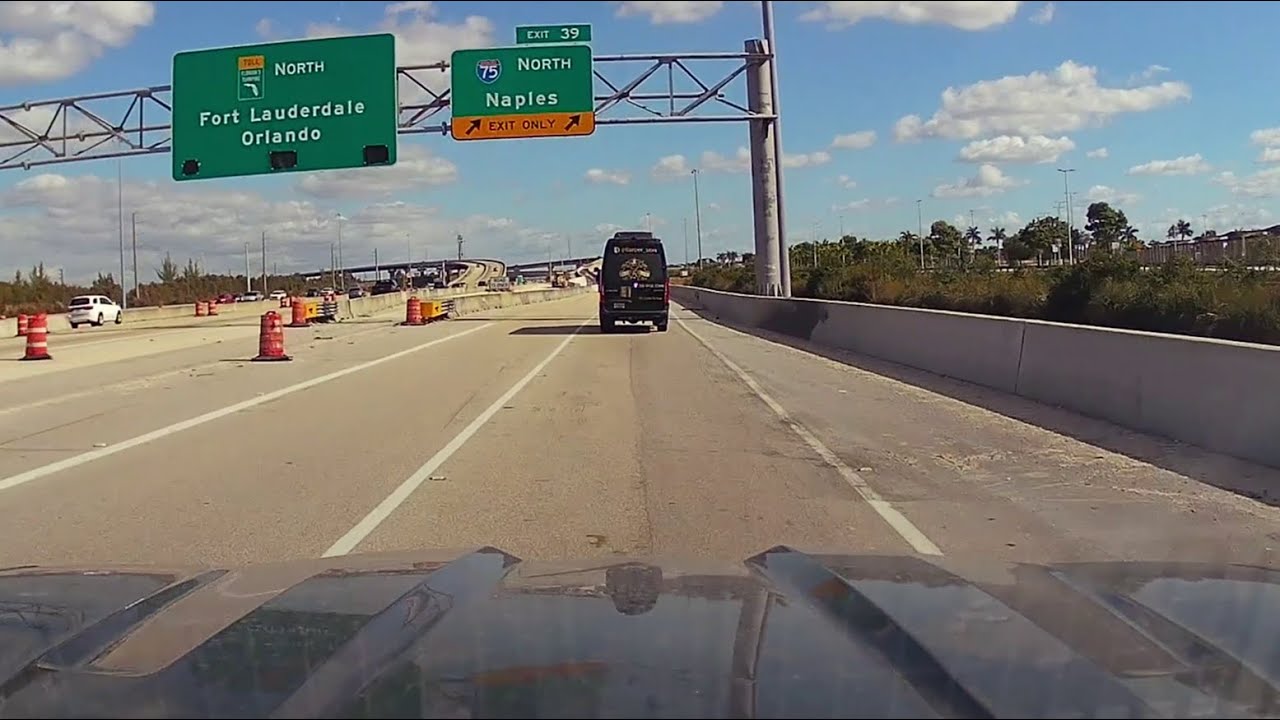 Driving in Miami on the Turnpike northbound towards I75. Light traffic ...