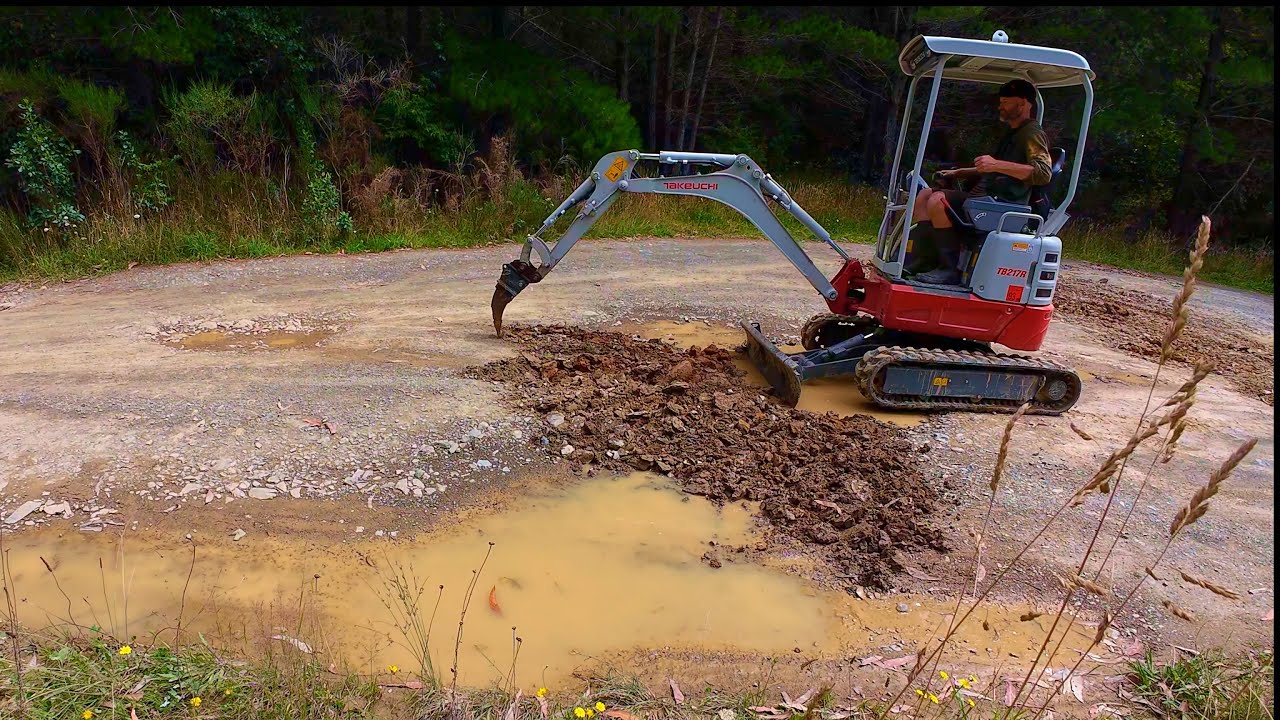 Fixing Deep Potholes with a Mini Excavator - Takeuchi TB217 in action ...