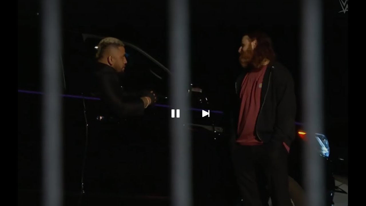 Jey and jimmy face to face and the honorary Uce standing with solo: raw ...