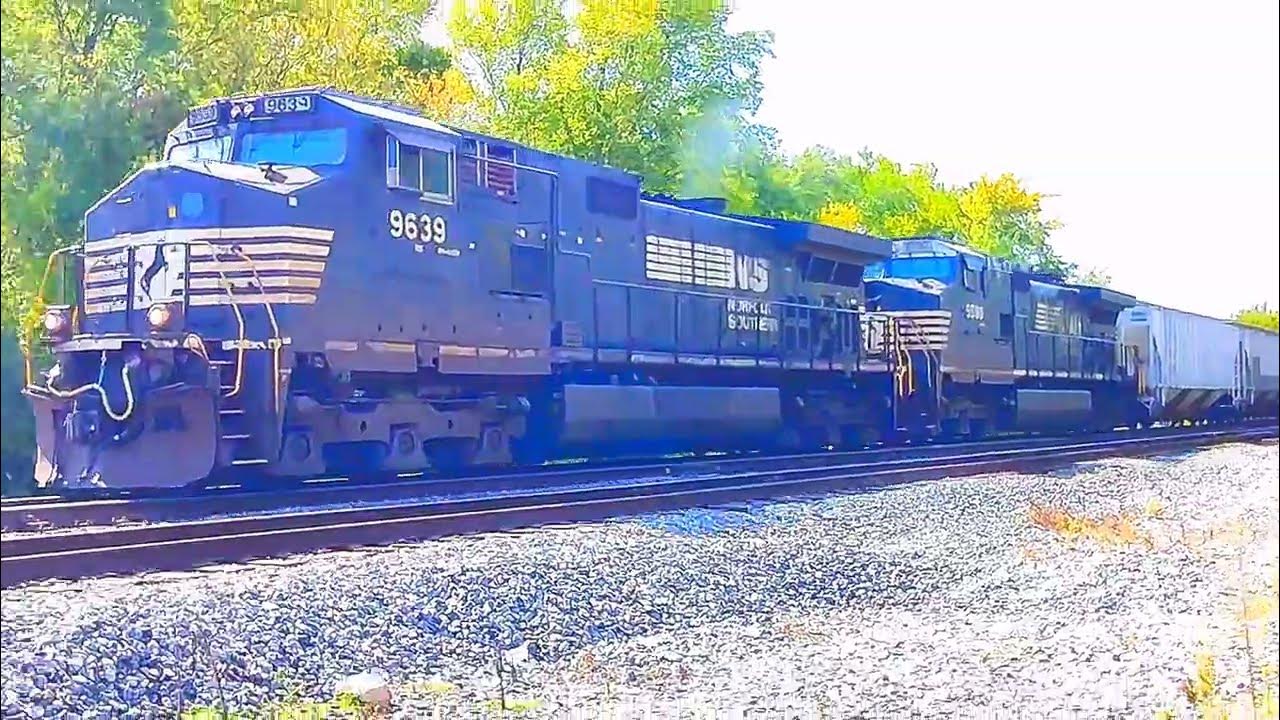 Union Pacific passes a Norfolk Southern Train in Tolono Illinois - YouTube