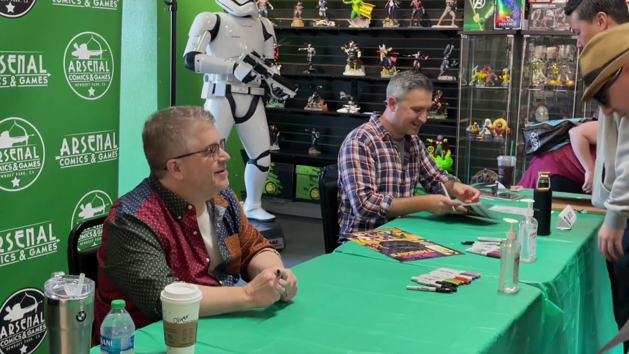 Fans line up for celebrity book signing at local comic store - YouTube
