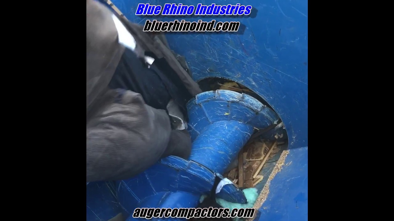 Crushing Sofas with a Blue Rhino Auger Furniture Compactor - YouTube