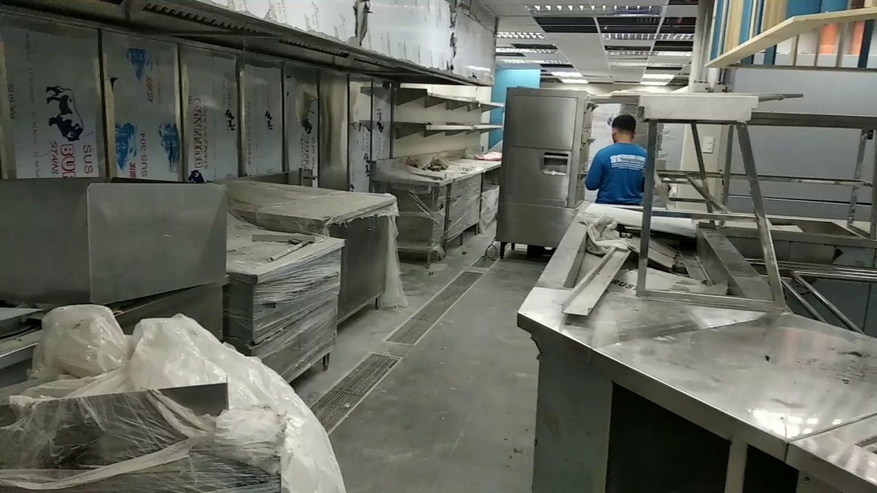 Installing kitchen stainless equipment in resort at the ilocos sur ...