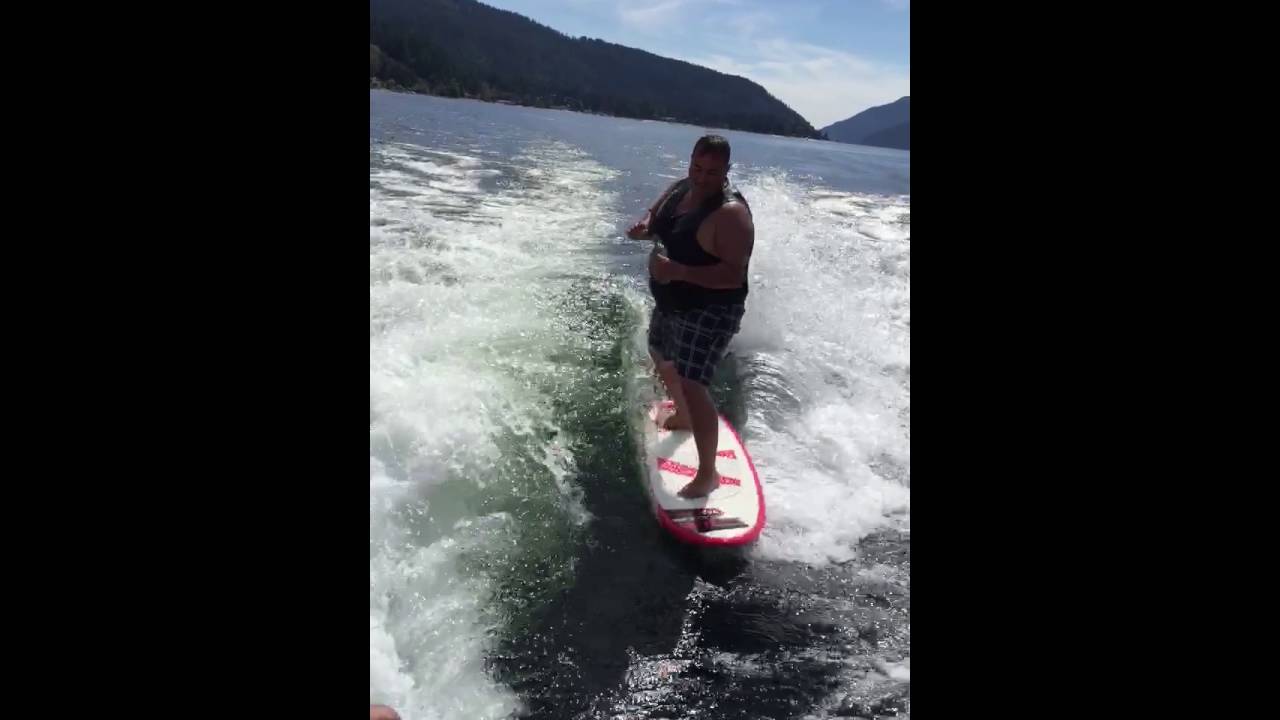 Big guy wake surfing - YouTube