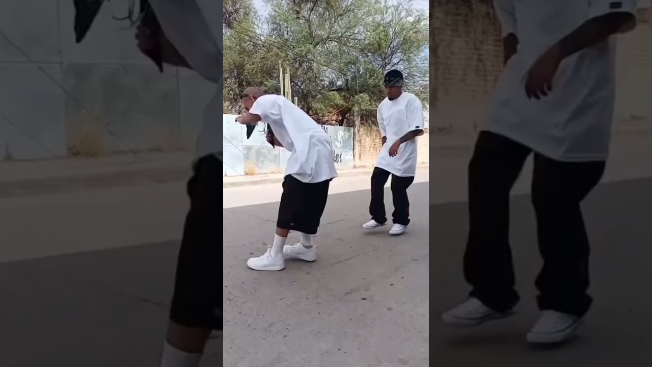 Dos cholos bailando cumbia wepa - YouTube