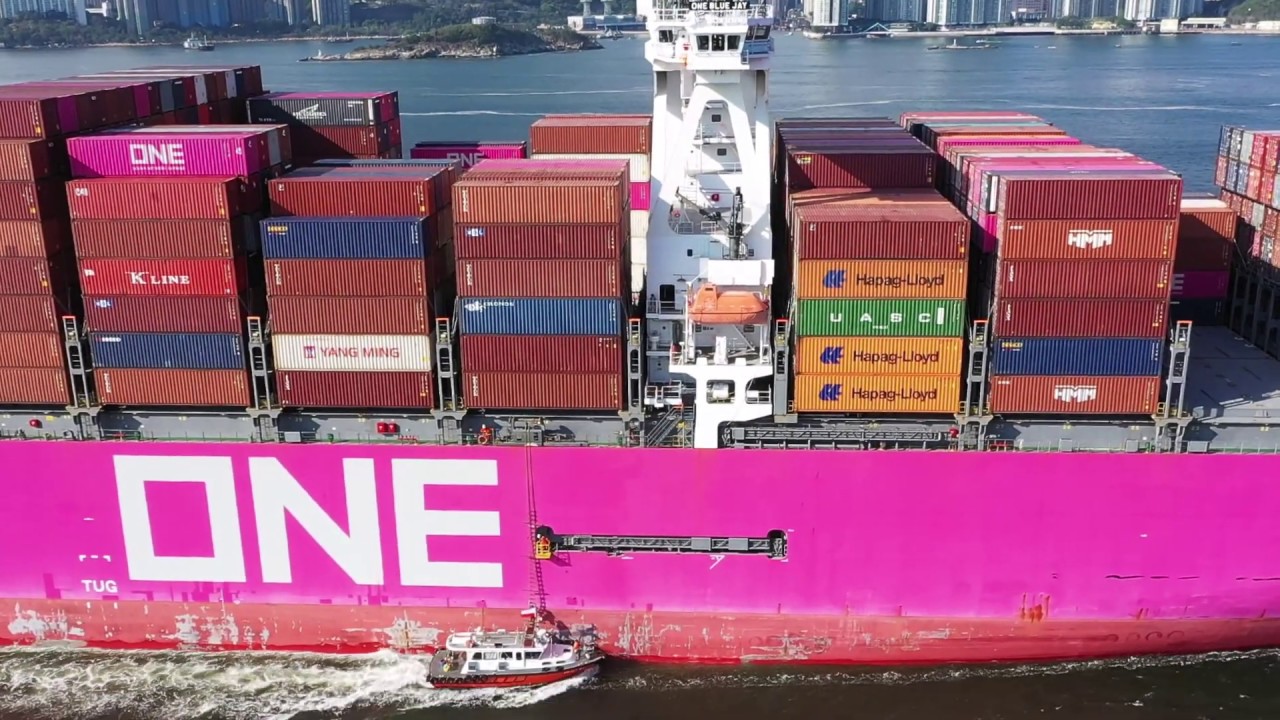 One Blue Jay large container ship departing Hong Kong harbour pilot ...