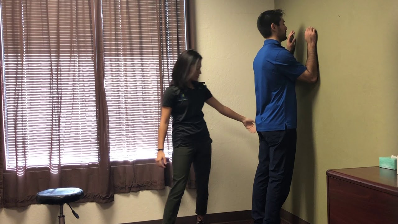 Standing Wall-Supported McKenzie Extension | Relieve Lower Back Tension ...