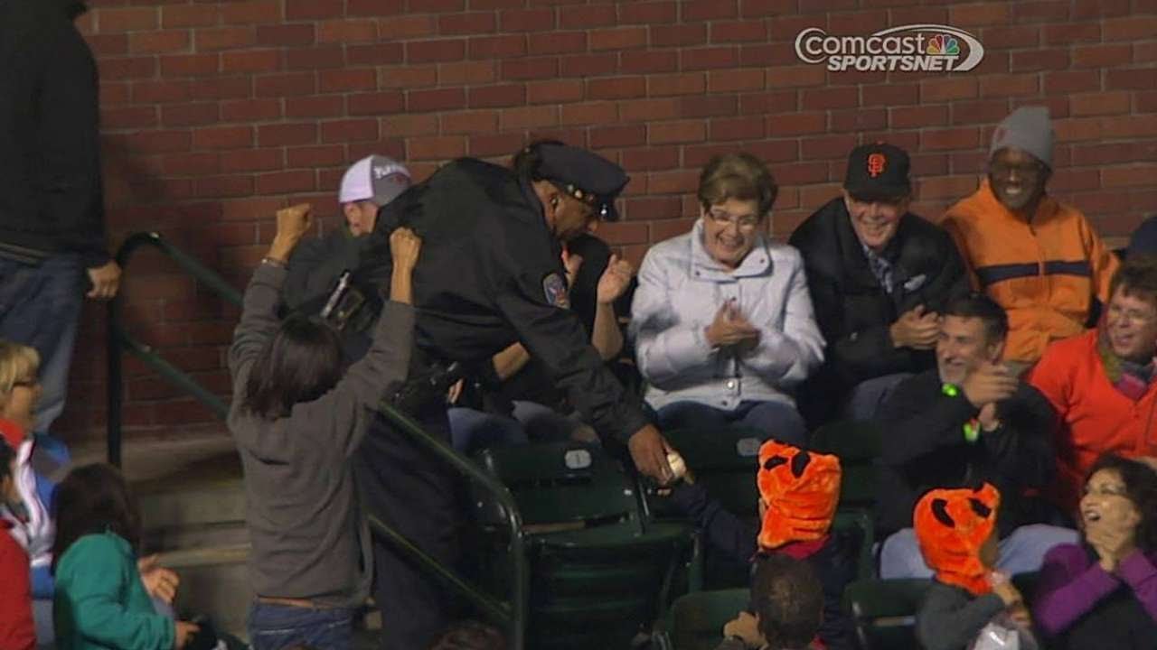 Cop makes great grab, gives ball to young fan - YouTube