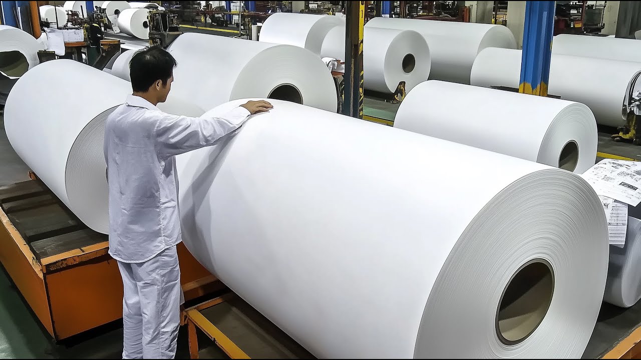 The process of mass producing paper hand towels. A paper factory in ...