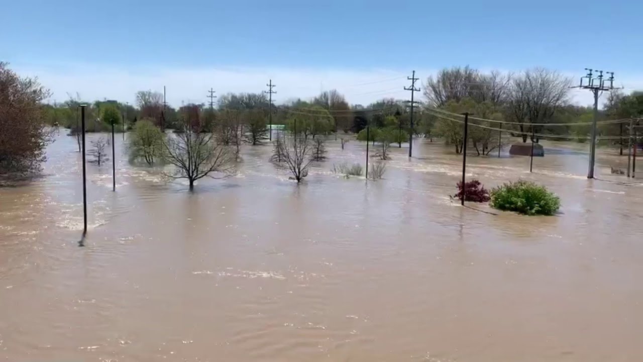 Downtown Midland under water: Vehicle bridge turns to pedestrian bridge ...