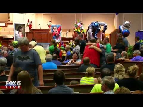 Young boy gets superhero funeral - YouTube