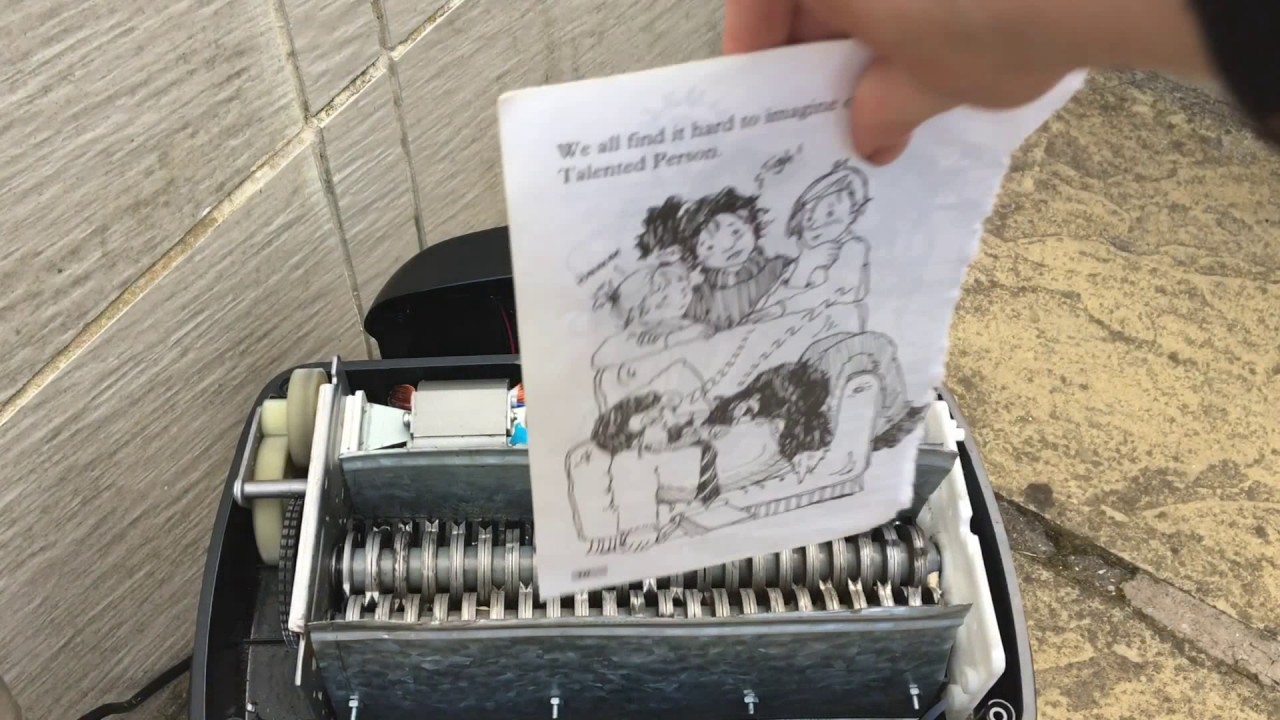 Shredding books 📚 📖 video ;) - YouTube