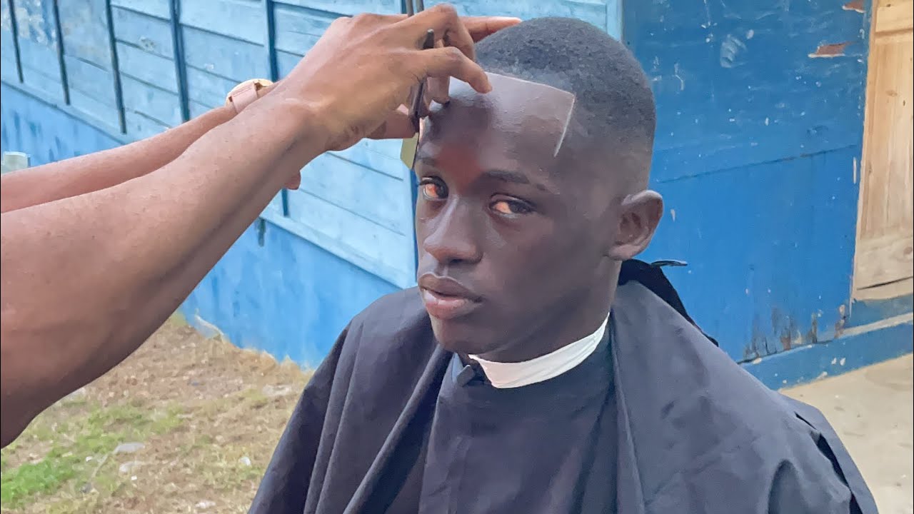 Giving free haircut to a Tacius Golding high student - YouTube