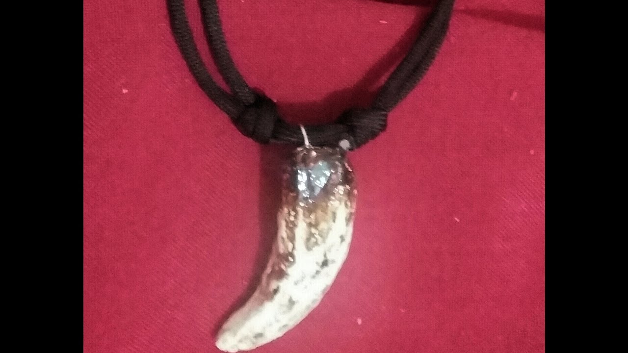 COMO HACER EL COLMILLO DE LOBO DEL REY LEONIDAS - YouTube