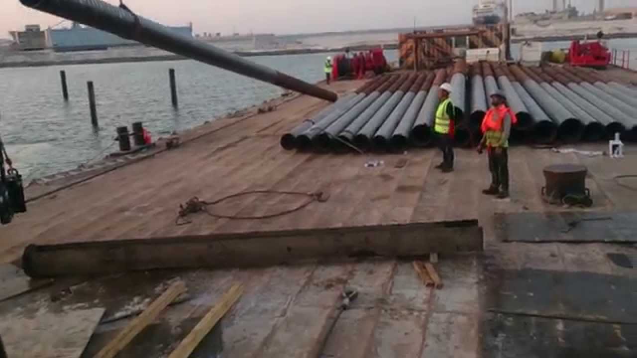 Driving Long Pile with Hammer Machine, Marine Works - YouTube