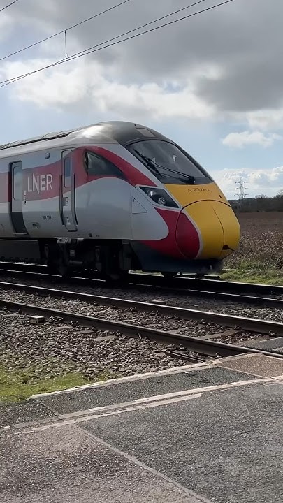 LNER Class 801 Azuma passing Norwell LC - YouTube