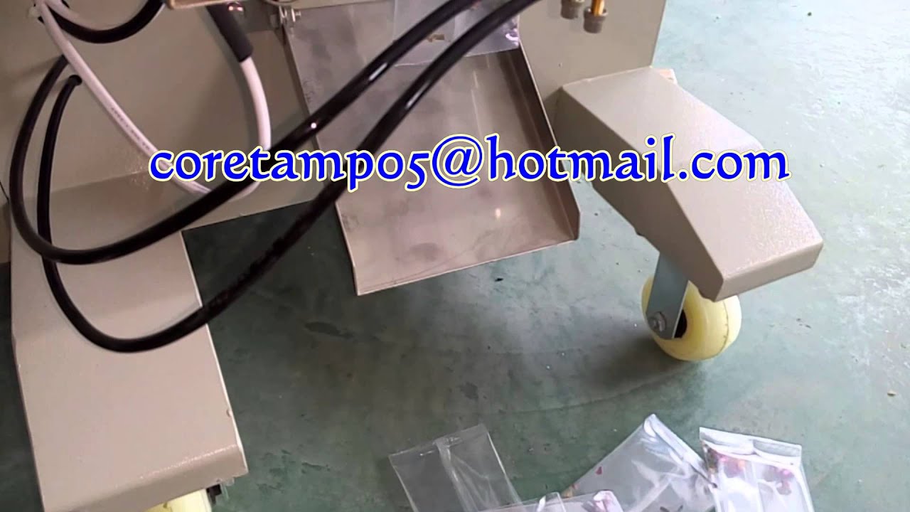 Small sachet packing machine, back side sealing - YouTube