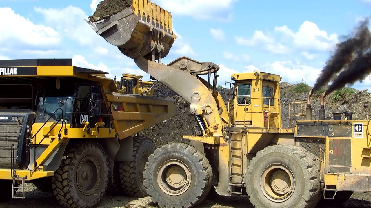 CAT Power at Work - Caterpillar 992C Loading 777F's - YouTube