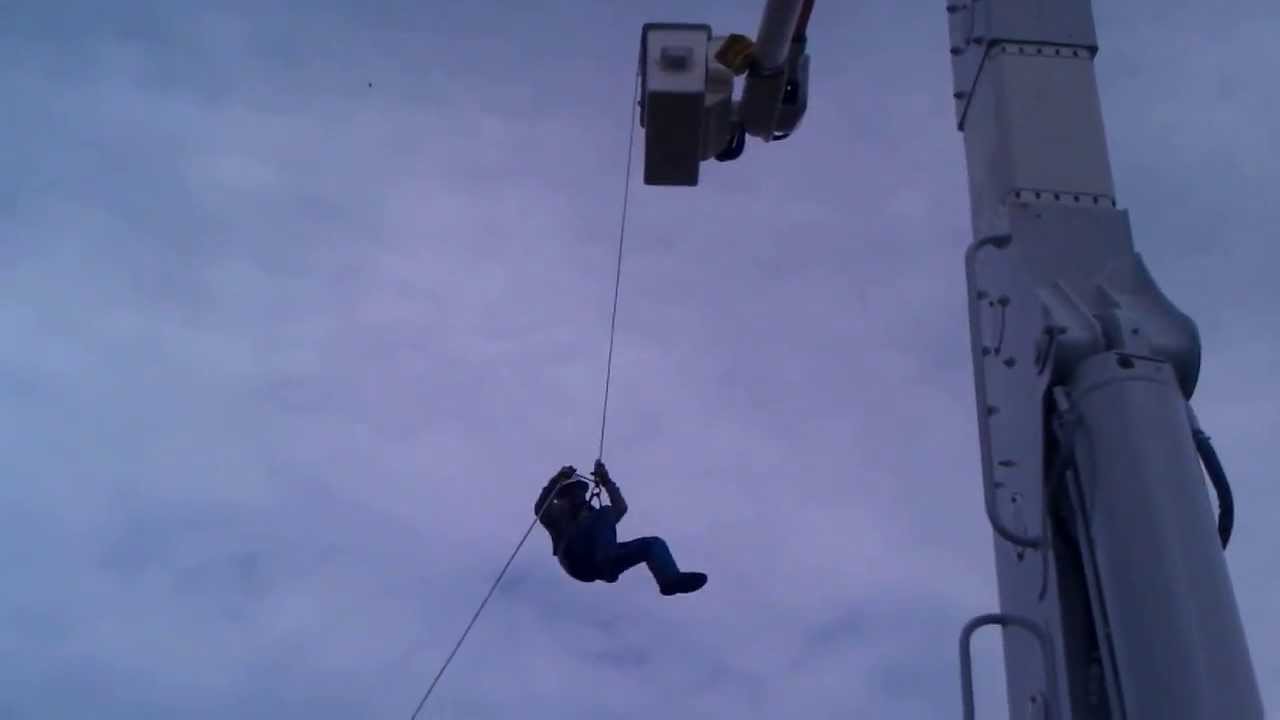 Man Jumps out of Bucket Truck - YouTube