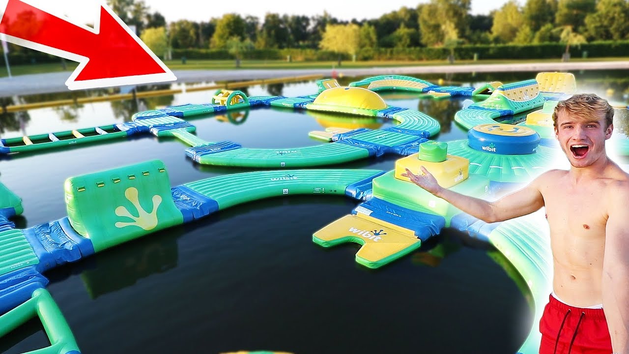 WIPEOUT CHALLENGE ON HUGE WATER TRAMPOLINE PARK ! - YouTube