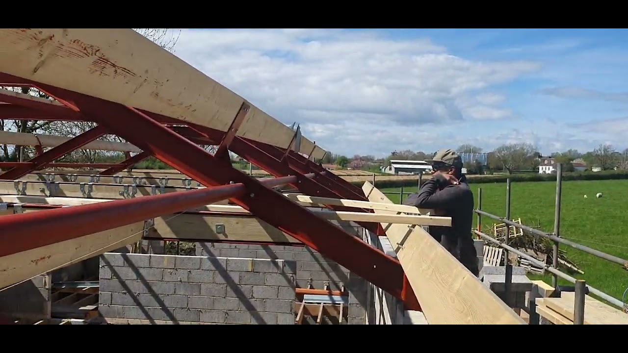Topping off roof structure with Yew tree sprig..contemplating next ...