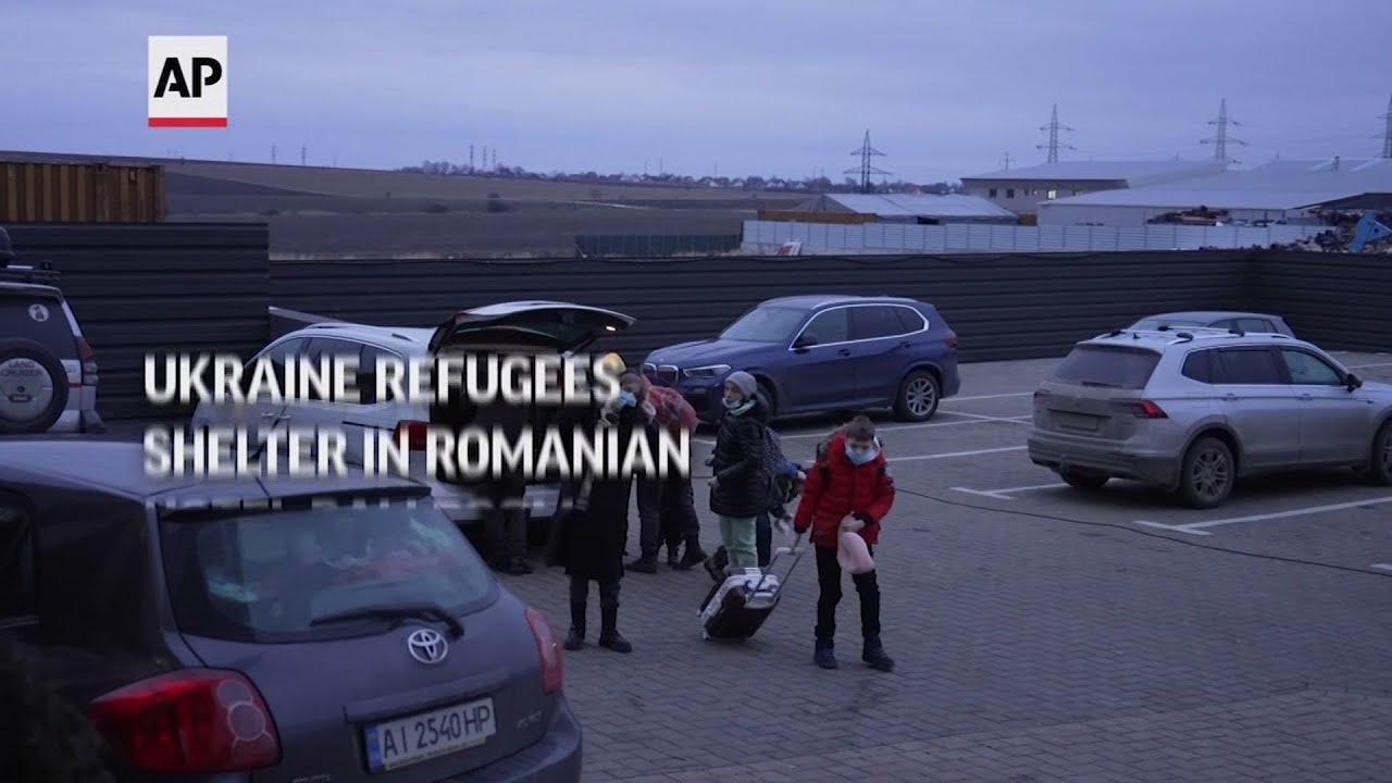 Ukraine refugees shelter in Romanian hotel ballroom - YouTube