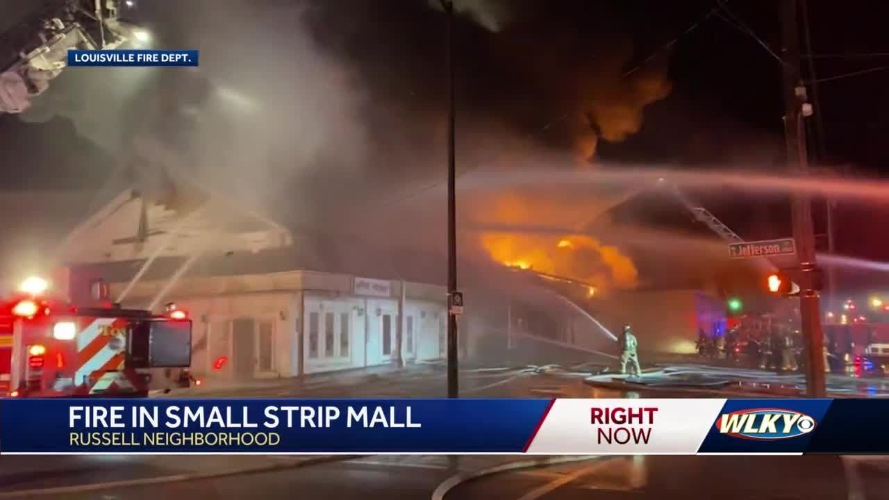 Small strip mall catches fire in Russell neighborhood - YouTube