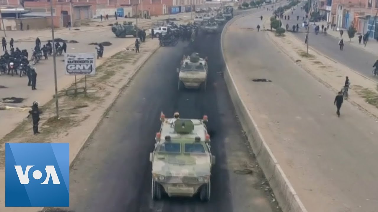Bolivian Military Deploys Armored Vehicles to End Blockade - YouTube