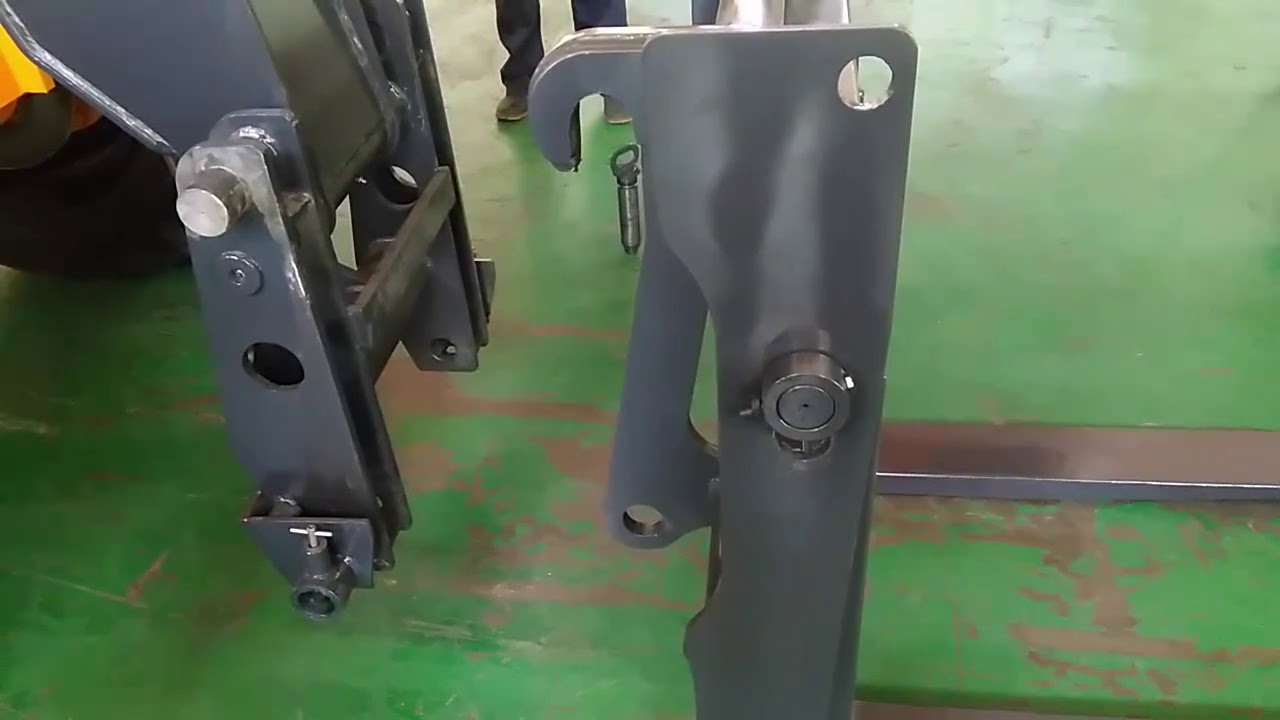 how to change forks and bucket for telehandler - YouTube