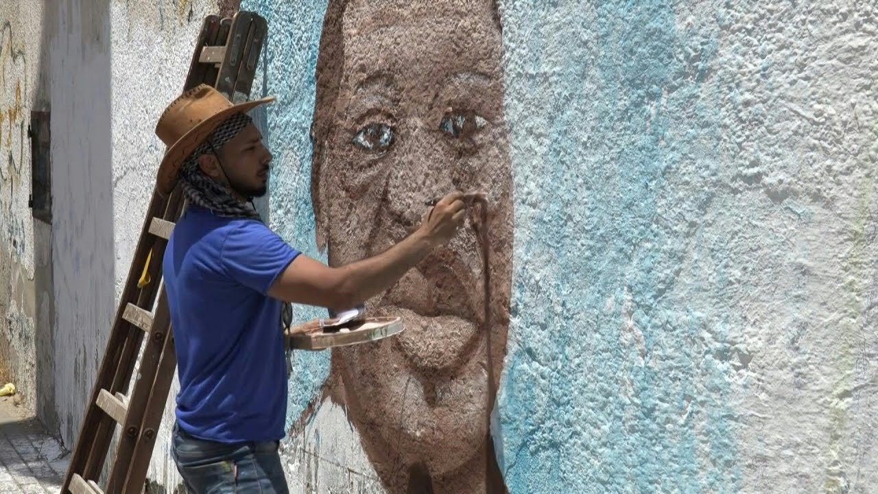 Palestinian artist draws portrait of George Floyd in Gaza City | AFP ...