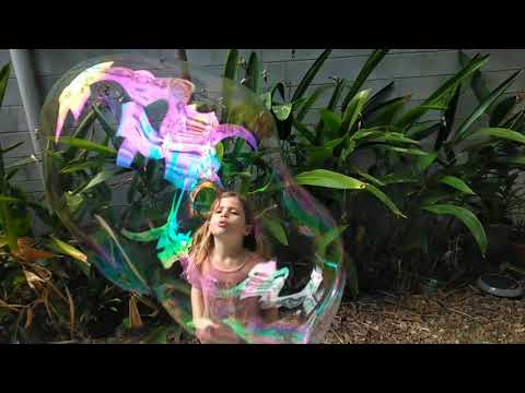 Bubble play blowing a bubble into a bubble by Maria Mormile - YouTube